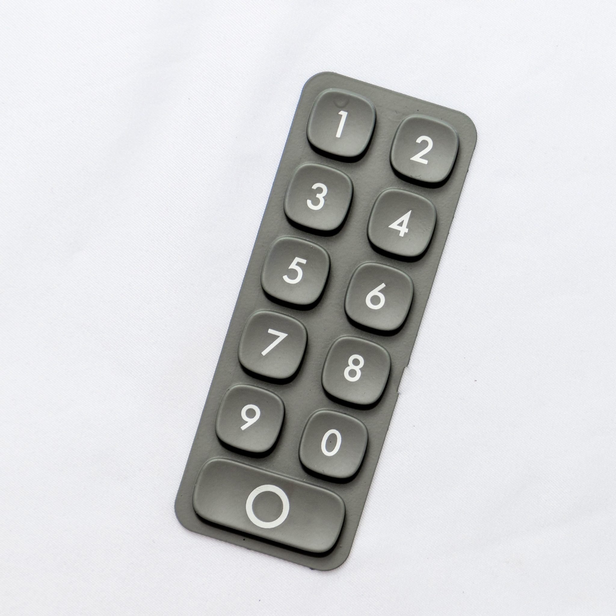 What are the customizable parts of the silicone rubber keypad?