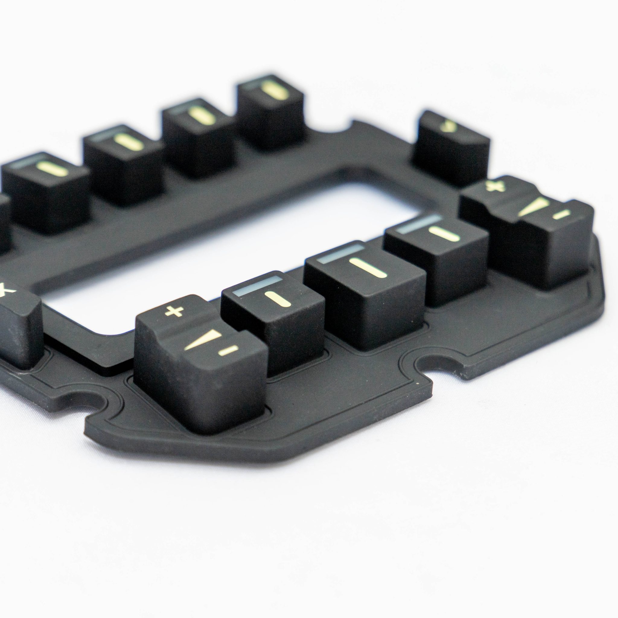 What affects the tactile response of a silicone rubber keyboard?