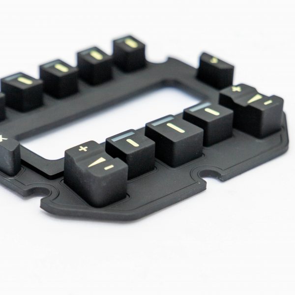What affects the tactile response of a silicone rubber keyboard?